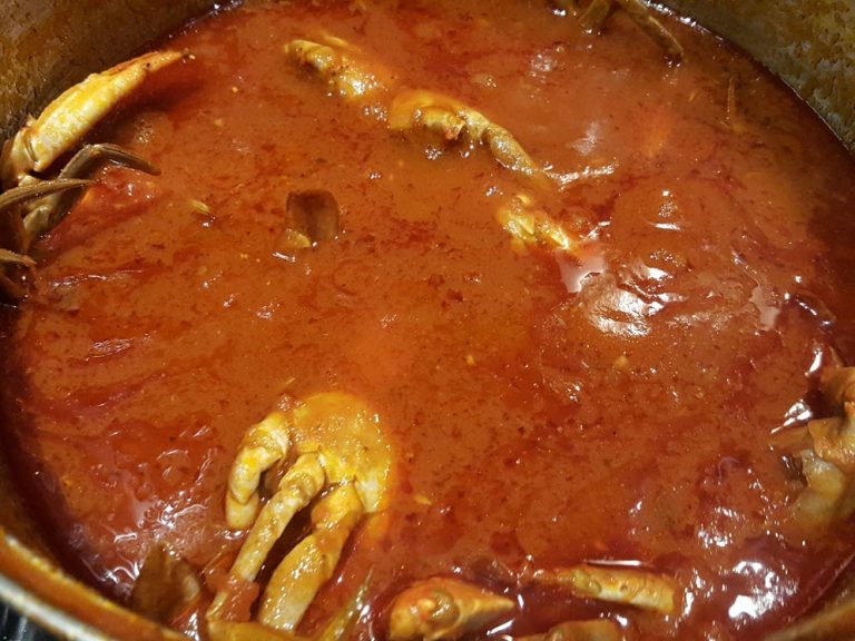 Fried Blue Stone Crabs In Savory Tomato Sauce Over Pasta Recipe