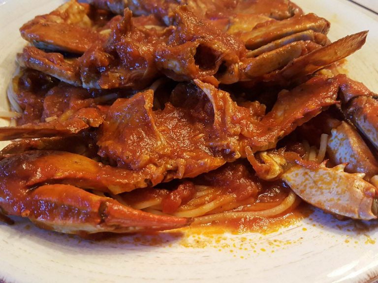 Fried Blue Stone Crabs In Savory Tomato Sauce Over Pasta Recipe
